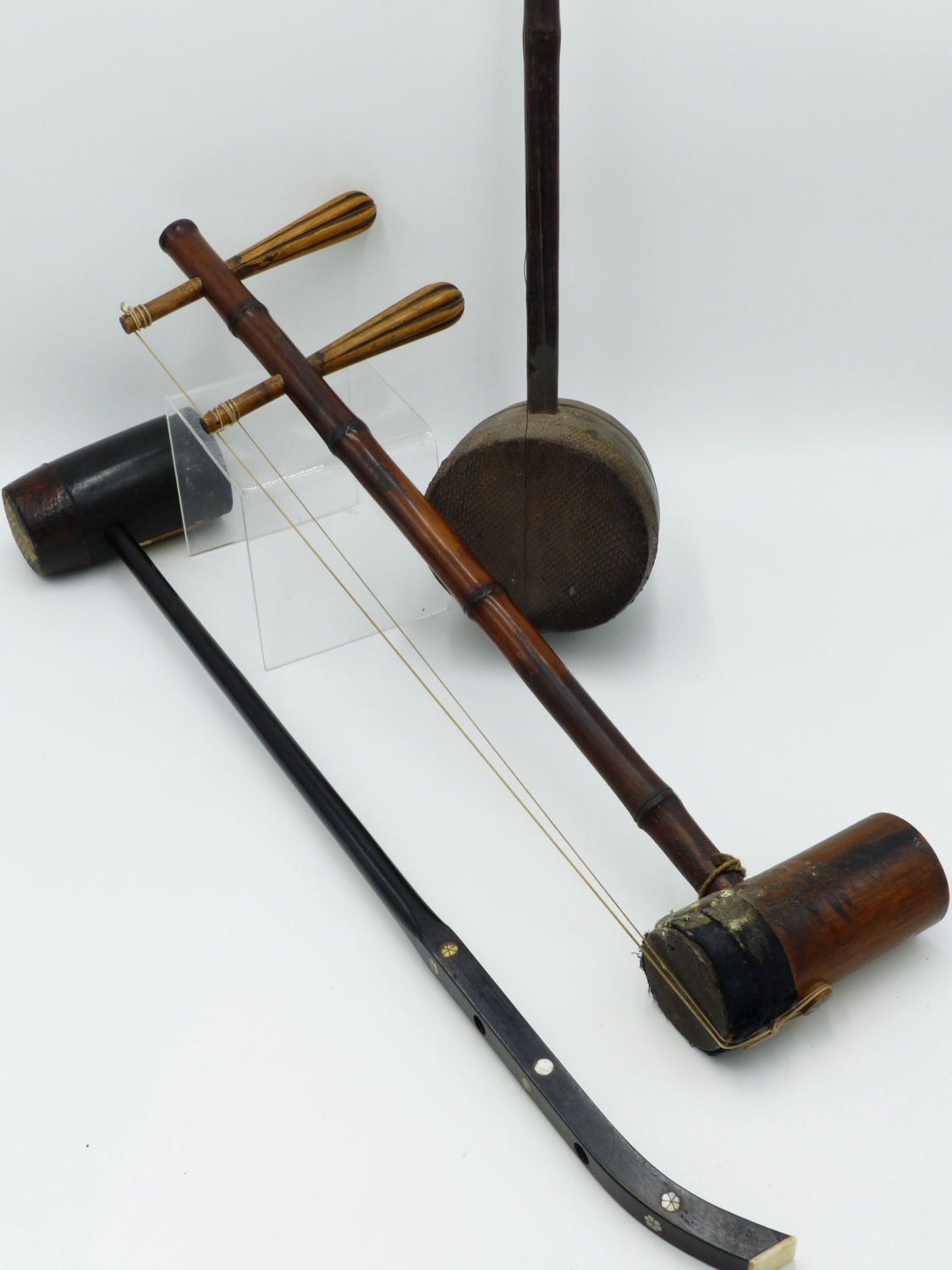 A CHINESE ERHU STRINGED INSTRUMENT OF BAMBOO AND SNAKESKIN CONSTRUCTION ...