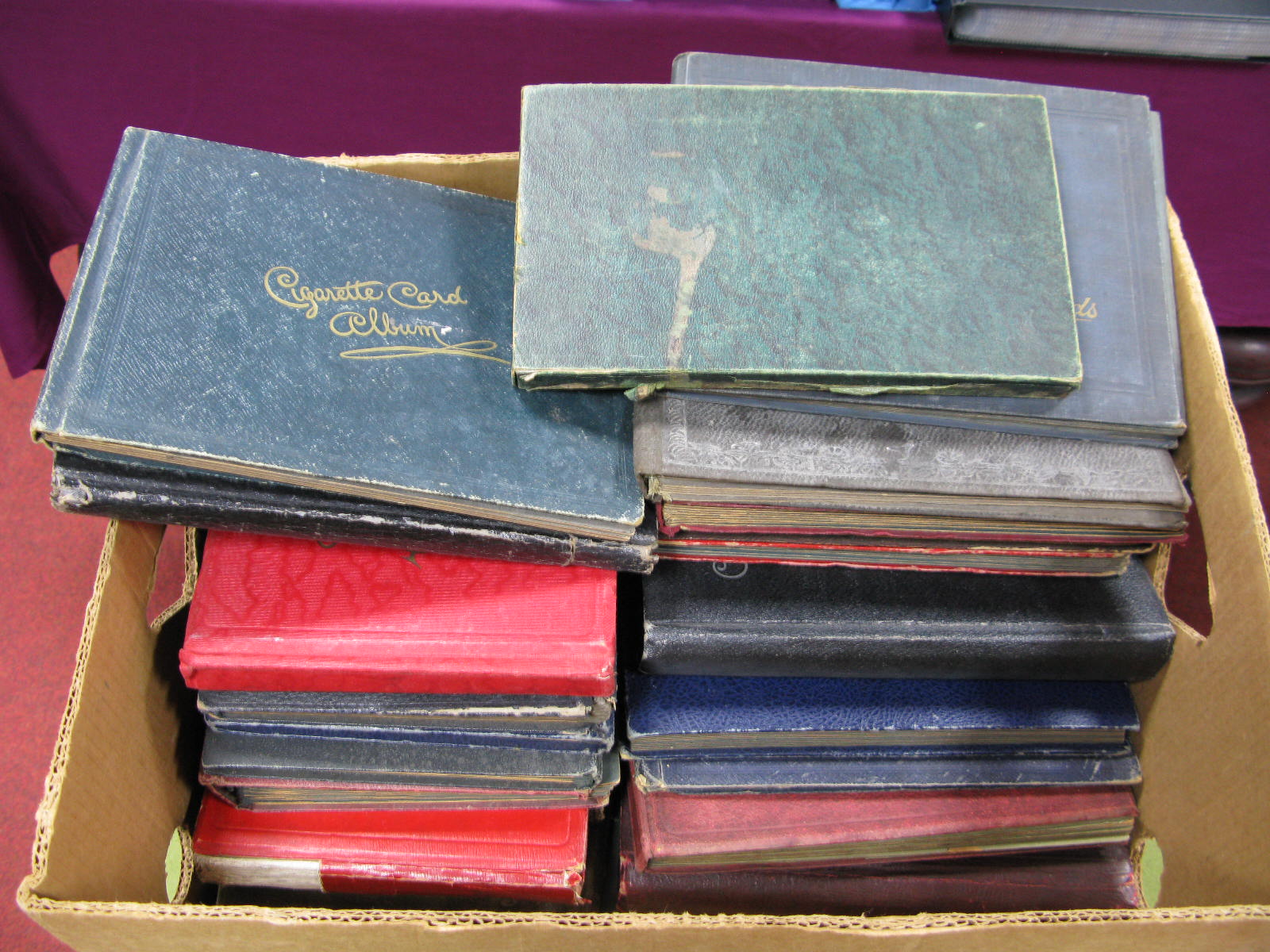 Twenty-One Empty Vintage Cigarette Card Albums.