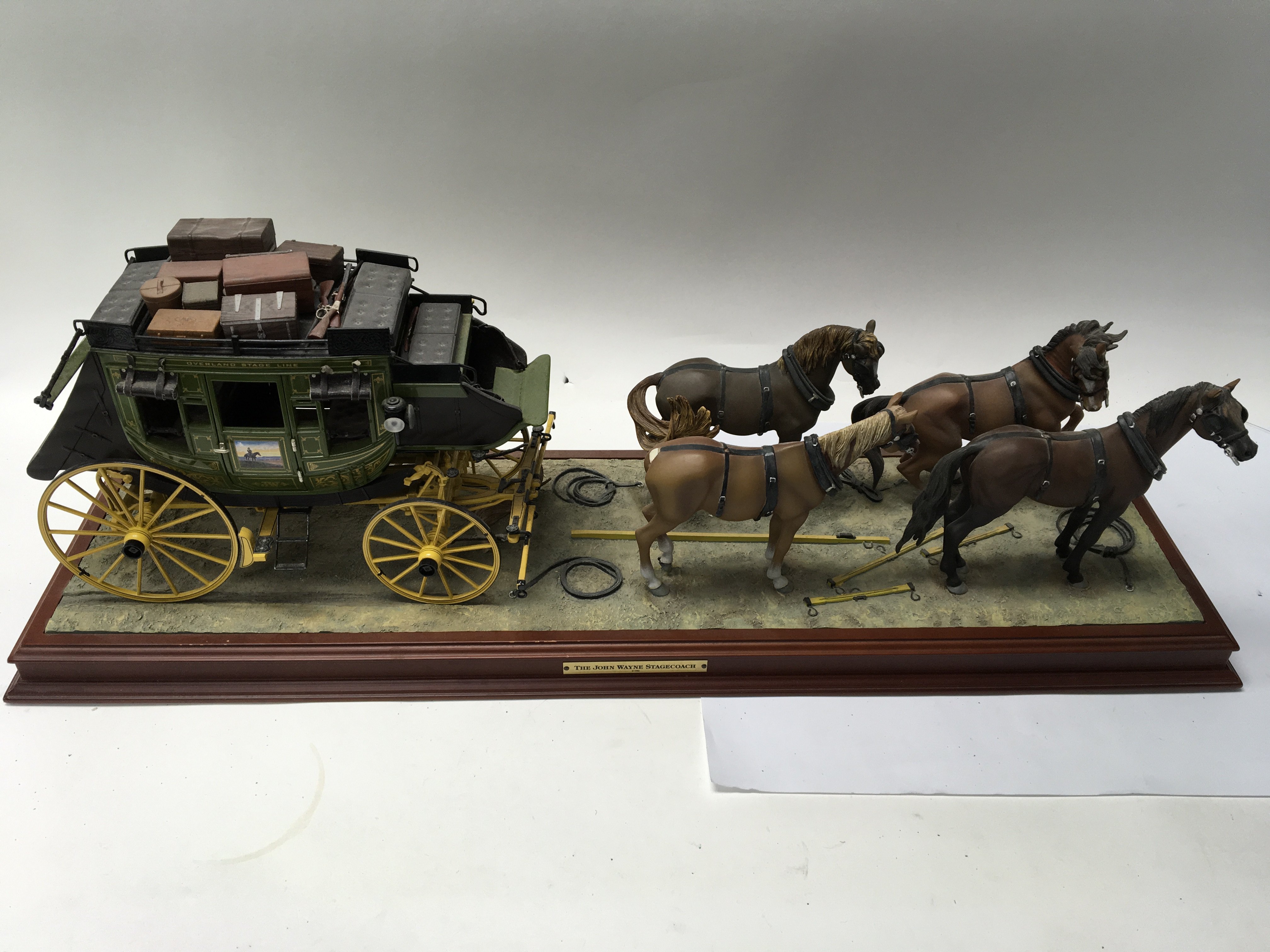 A John Wayne limited edition stagecoach, with interior, luggage and ...