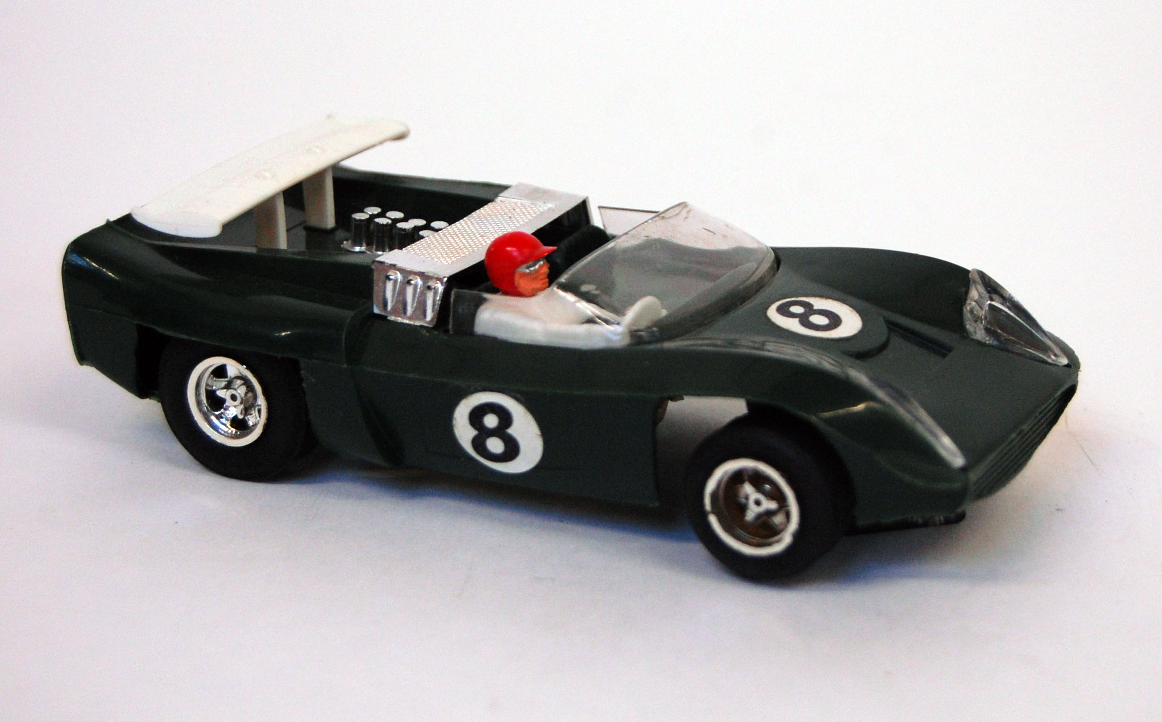 A Scalextric C4-11 Electra in green, racing number 8 CONDITION REPORT ...