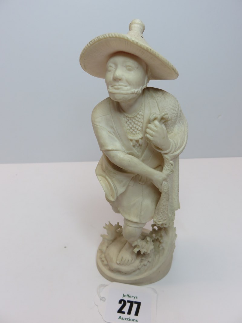 ANTIQUE IVORY CARVING, Eastern signed carved ivory figure of "Fisherman ...