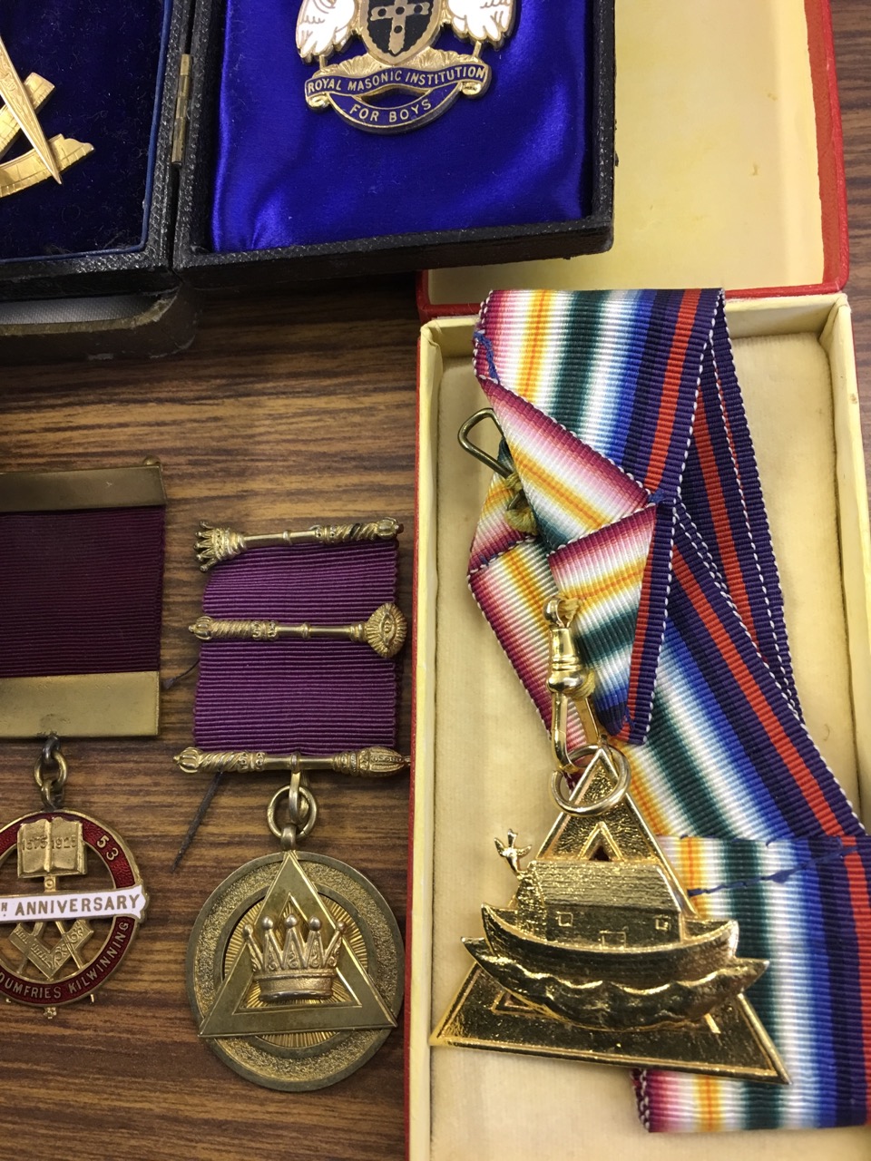 A collection of masonic medals, some 9ct gold, enamelled, silver ...