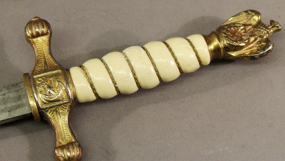 WW2 GERMAN NAVAL DAGGER having eagle pommel and wire bound handle, the ...