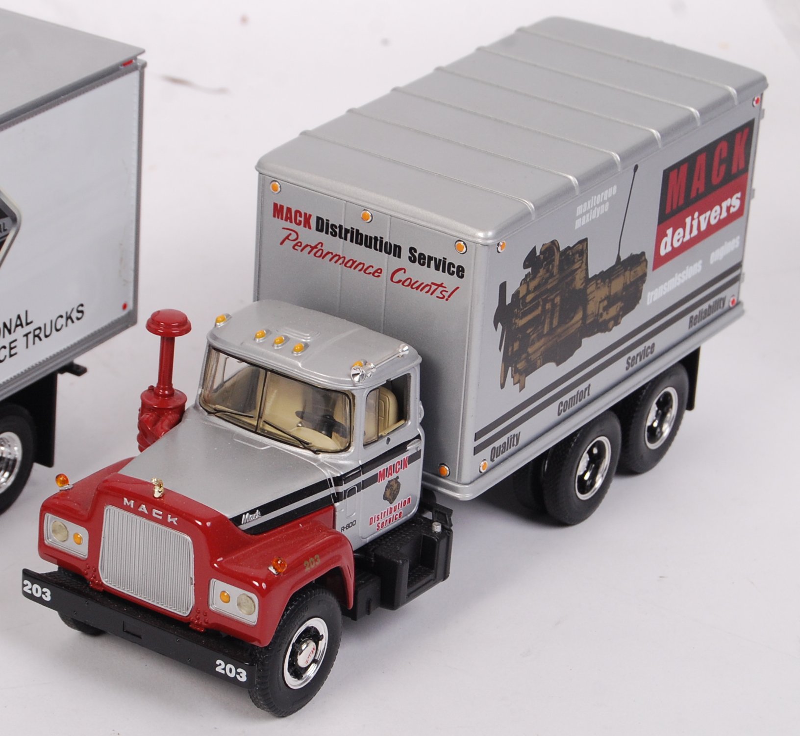 A collection of 5x American made First Gear 1:34 scale precision ...