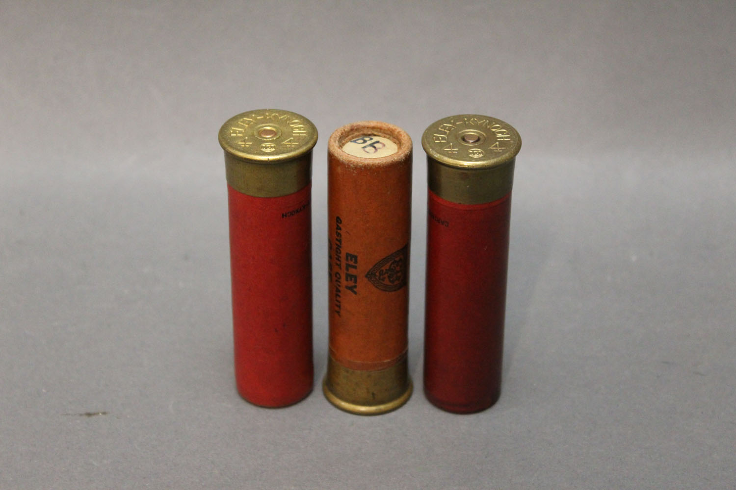Three 4 bore paper cased cartridges, Eley, Kynoch and Eley Nobel ...