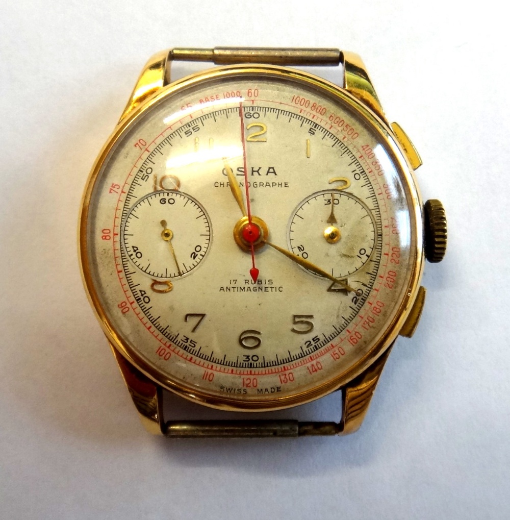 An Oska gold, circular cased gentleman's chronograph wristwatch, with ...