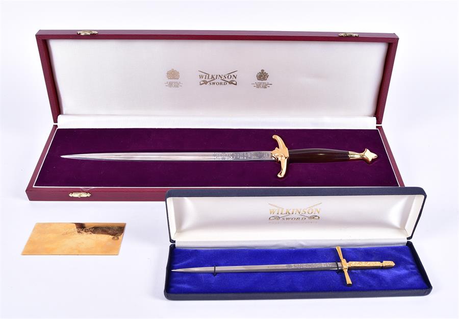 A cased Wilkinson Sword presentation dagger with turned and polished ...