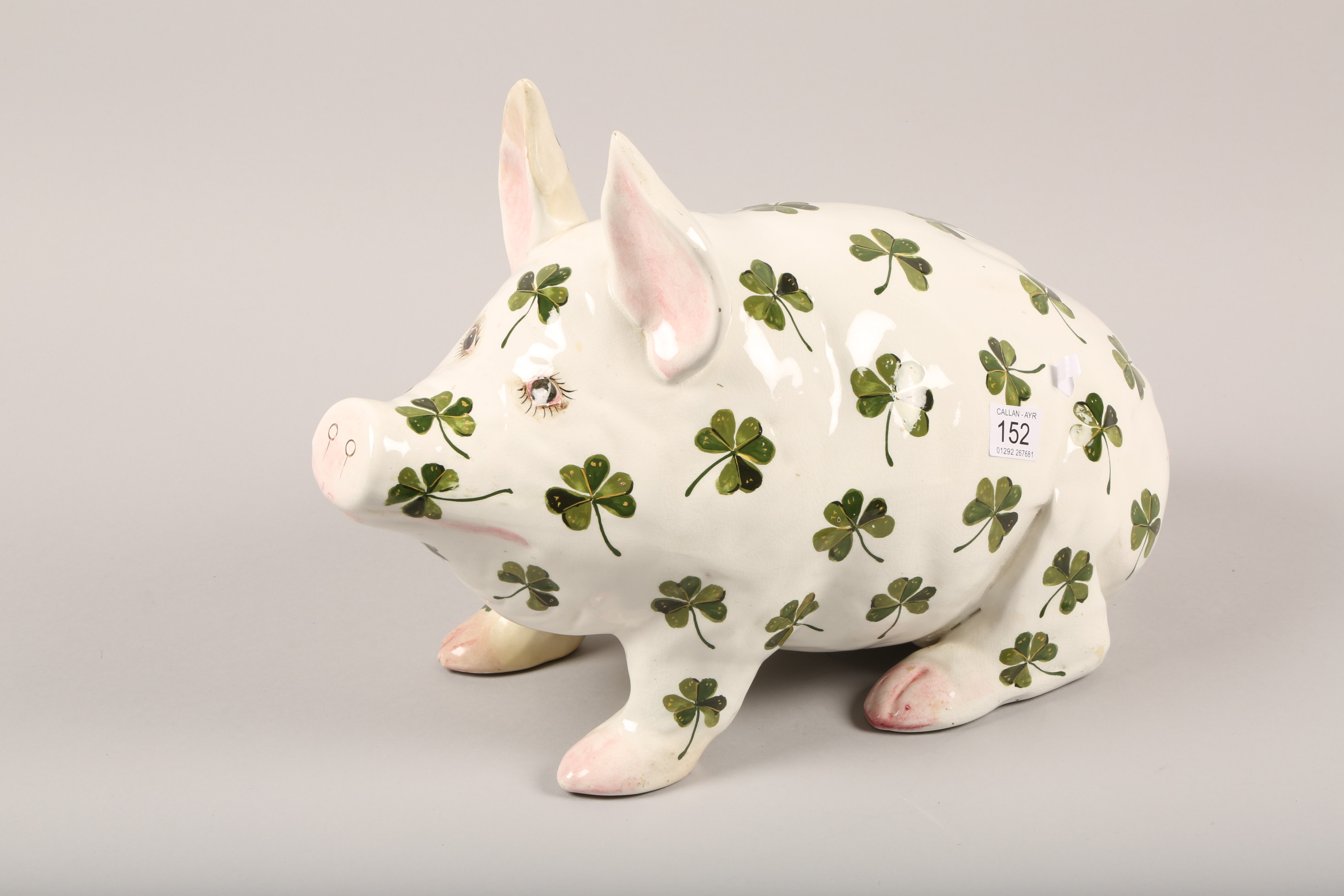 Large Wemyss pottery pig, modelled seated on its haunches, hand painted ...