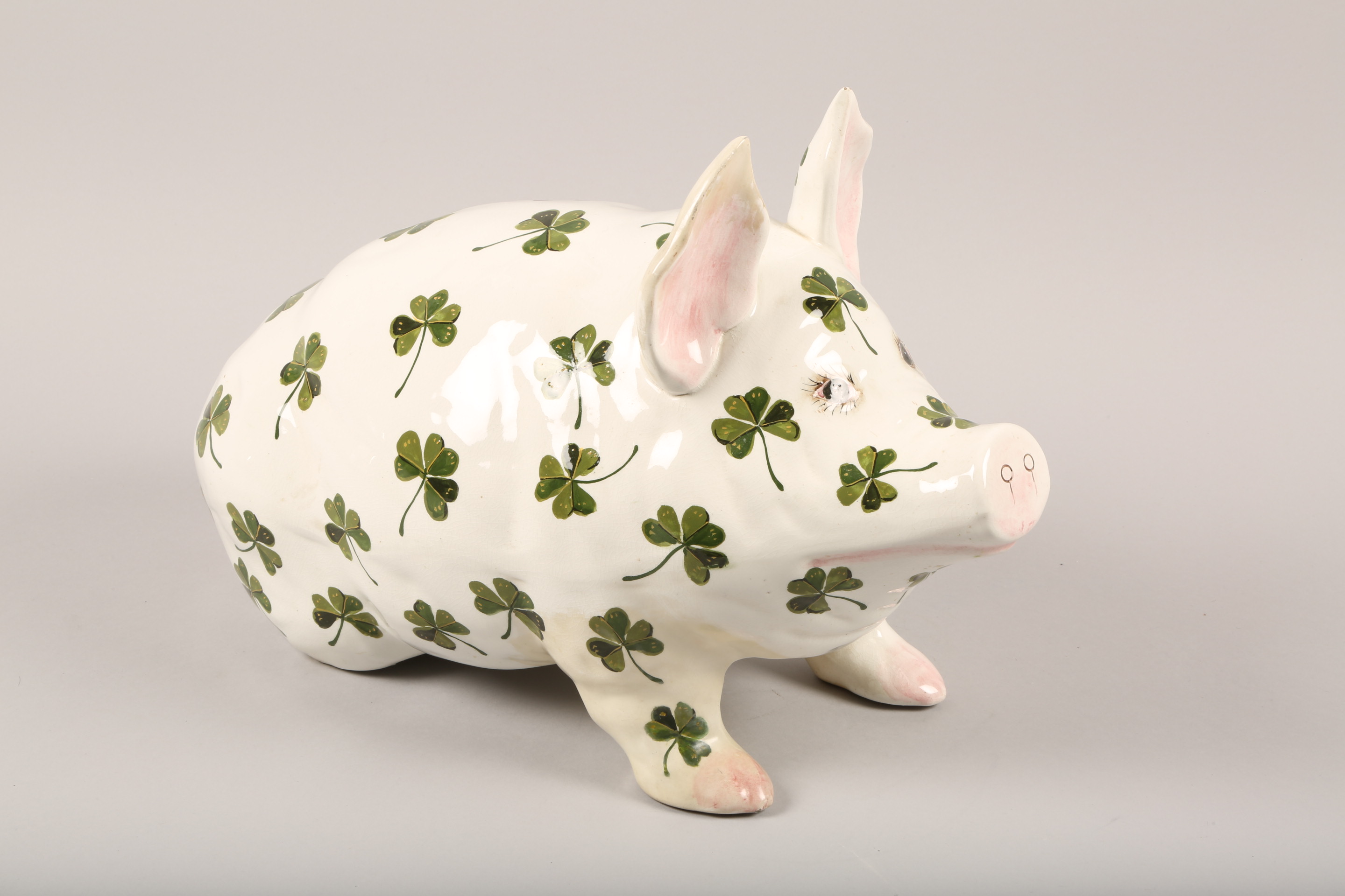 Large Wemyss pottery pig, modelled seated on its haunches, hand painted ...