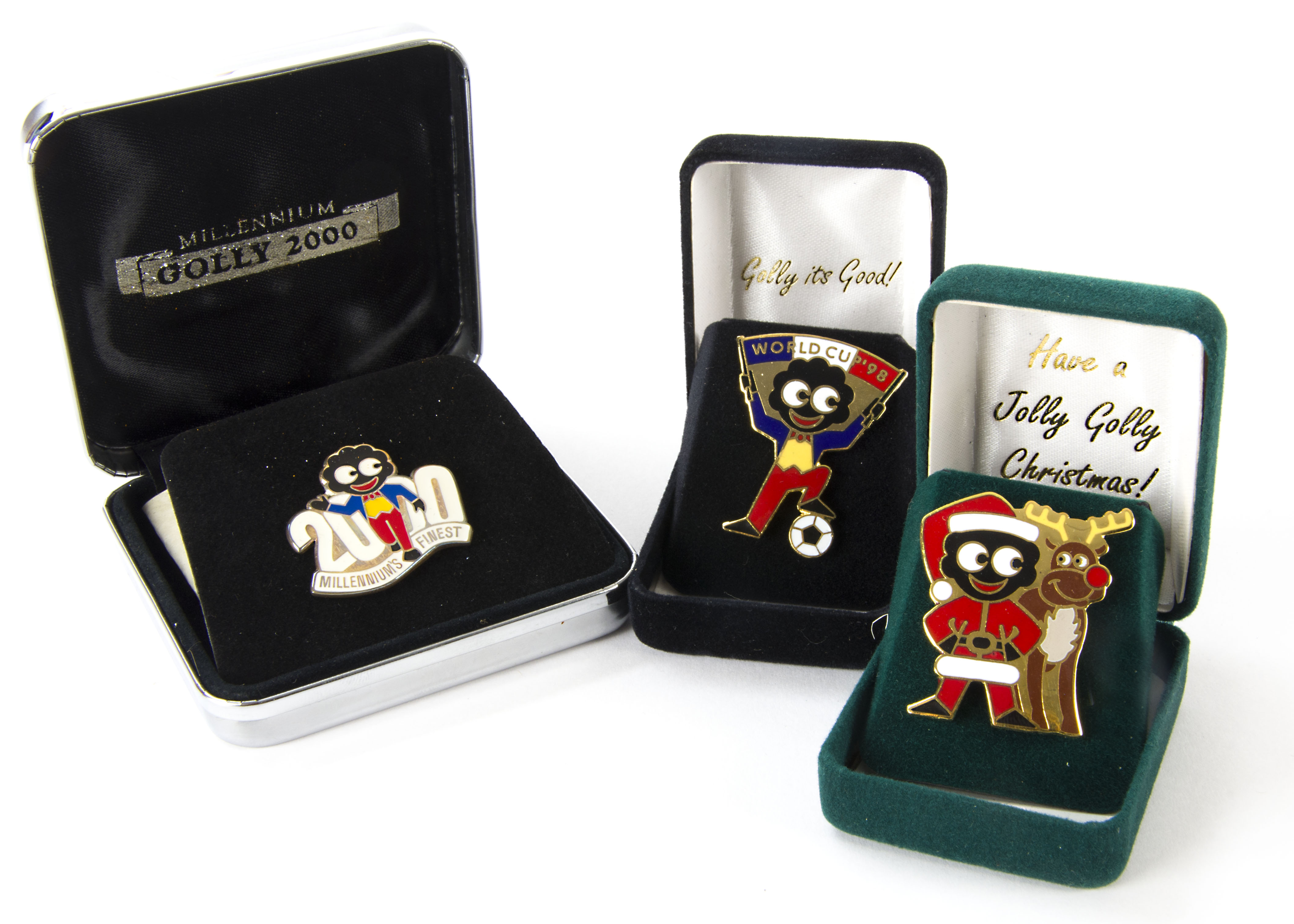 A collection of modern Robertson's Golly badges, including a 2000 ...