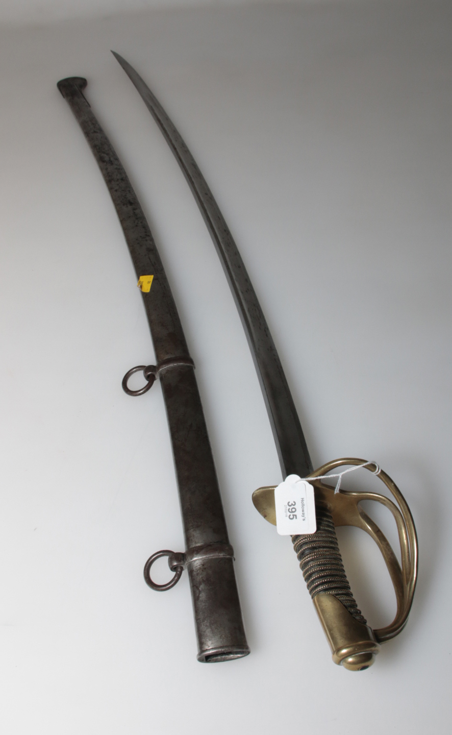 A French 1822 pattern cavalry sabre, the 90cm curved fullered blade ...