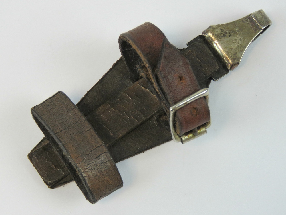 A brown leather vertical dagger hanger for a German SA dagger in ...