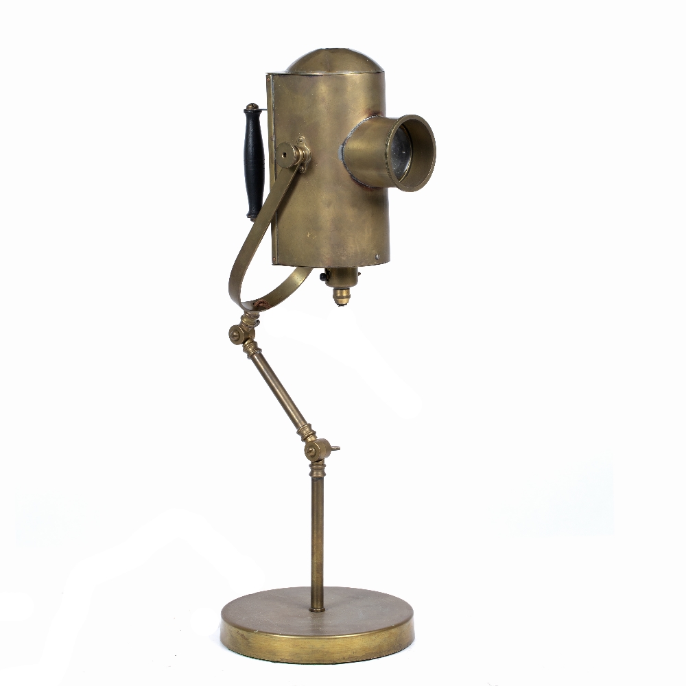 AN ADJUSTABLE BRASS MICROSCOPE LAMP with turned wooden handle and ...