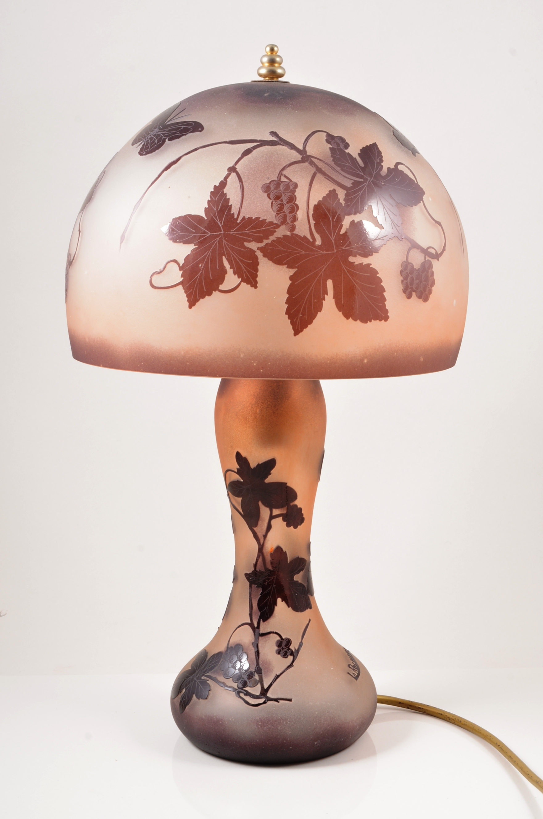 La Rochere, a cameo glass table lamp, the domed shade acid-etched with ...