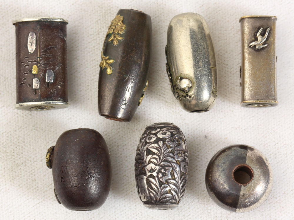 (lot of 7) Japanese ojime beads, 19th century, including shakudo and ...