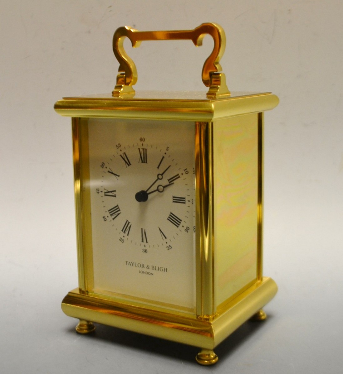 A Taylor and Bligh brass carriage clock