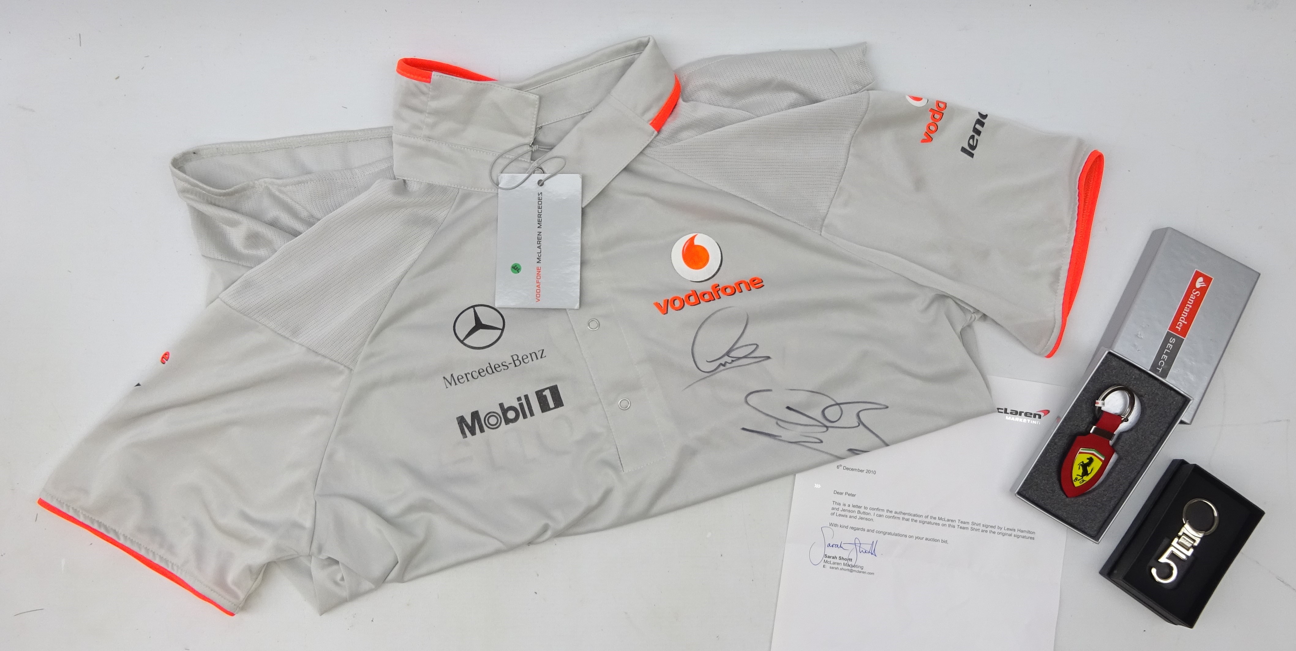 2010 Vodafone McLaren Mercedes Team Polo Shirt signed by Lewis Hamilton ...