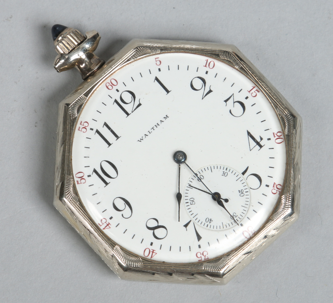 A 14 carat white gold Waltham Art Deco octagonal pocket watch. With ...