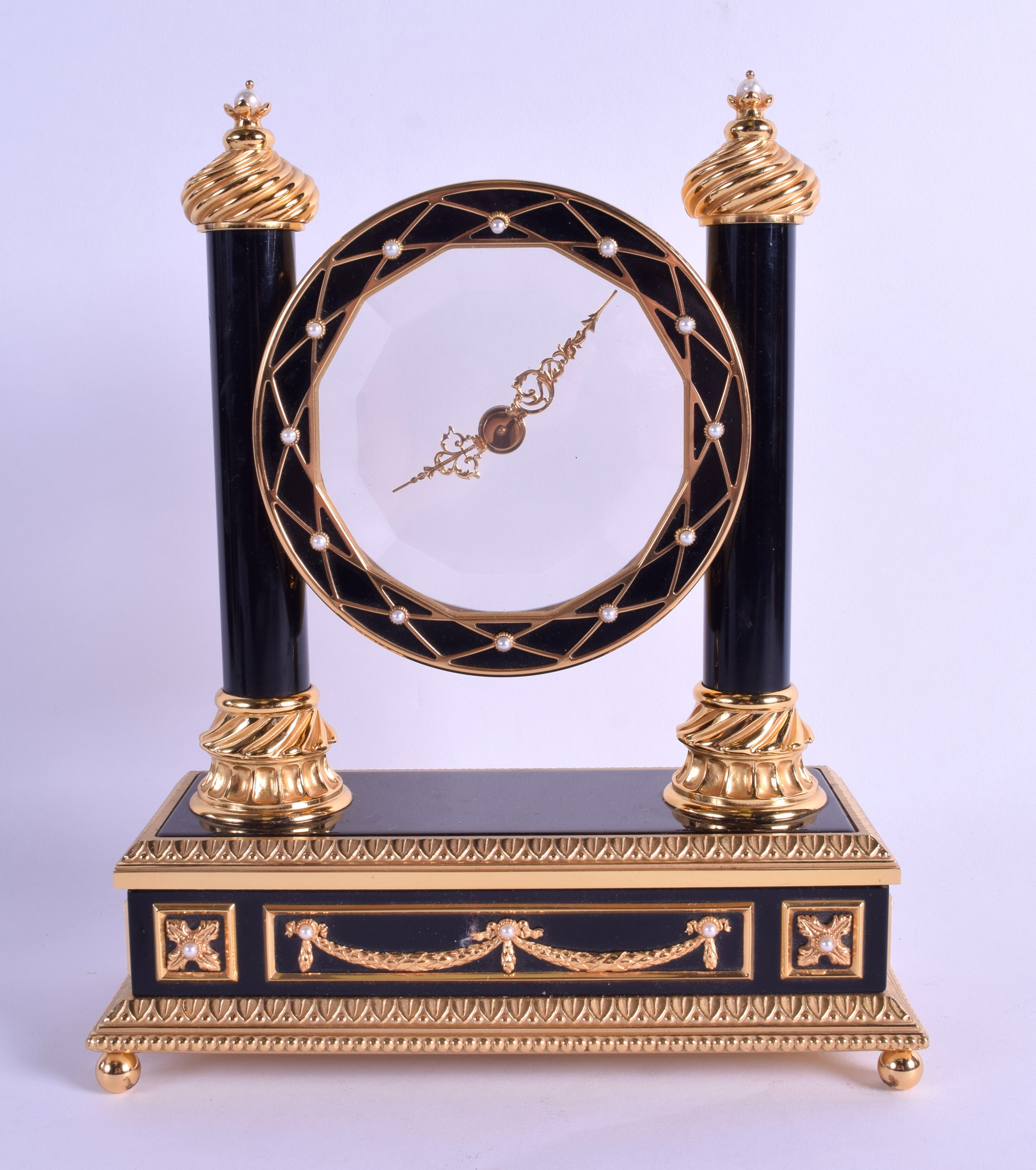 A 1980S FRANKLIN MINT FABERGE LIMITED EDITION MYSTERY CLOCK with twin ...