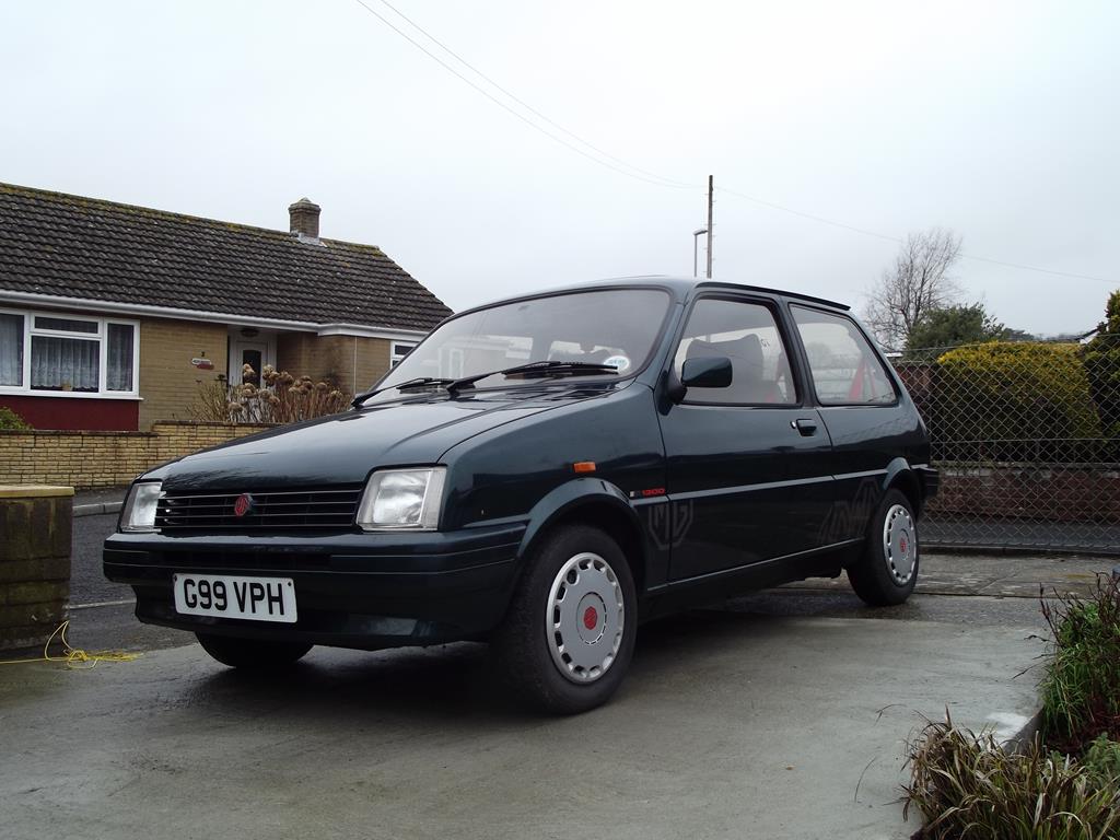A 1990 MG Metro 1300, registration number G99 VPH, British Racing green ...
