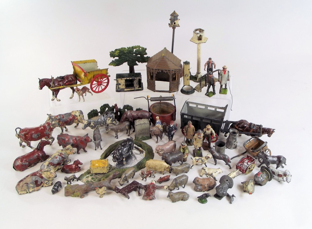 BRITAINS FARM FIGURES. A large collection of farm animals & equipment ...