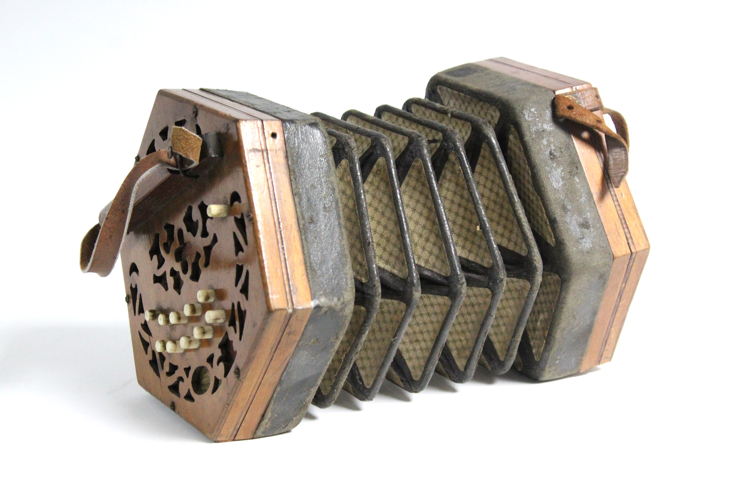 A Lachenal & Co. of London concertina with star printed paper bellows ...