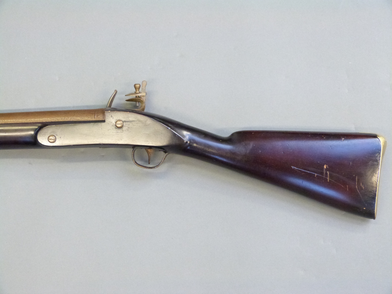 Flintlock hammer action musket with engraved Roman type lock, engraved ...