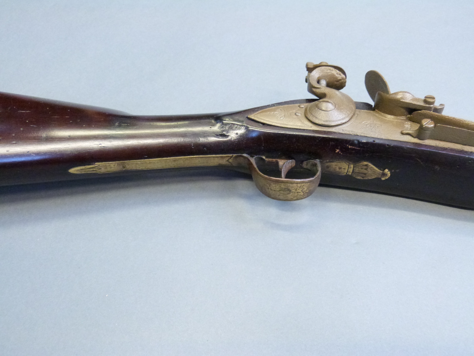 Flintlock hammer action musket with engraved Roman type lock, engraved ...