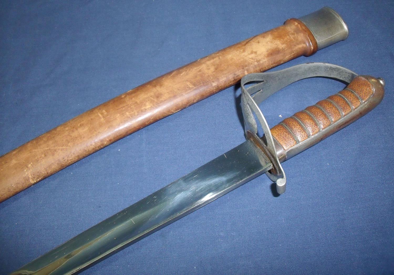 Mid to late 20th C Indian sword with 30 inch slightly curved single ...