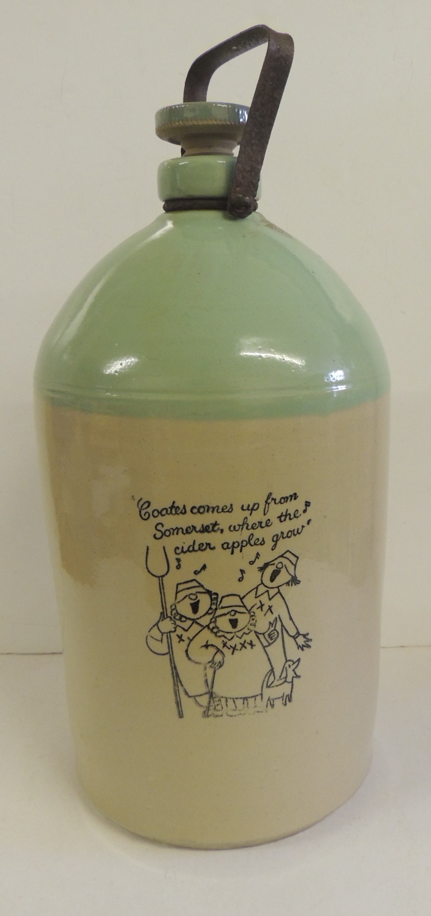 A large Coates Cider stoneware flagon with light green shoulders and ...