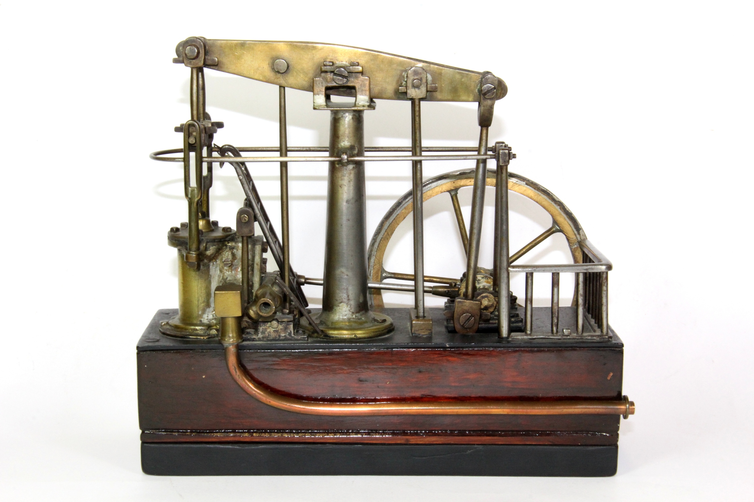 A model steam engine water pump, Size. 23 x 20cms.