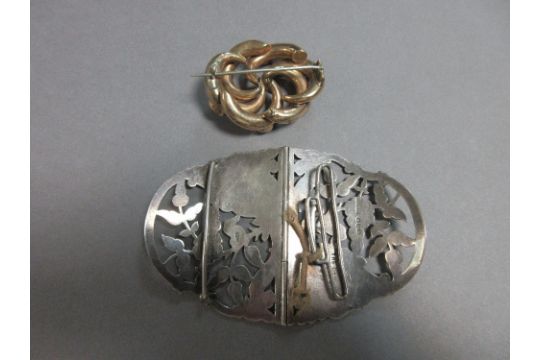 A Victorian brooch set with cabochon garnets together with a 9ct gold ...