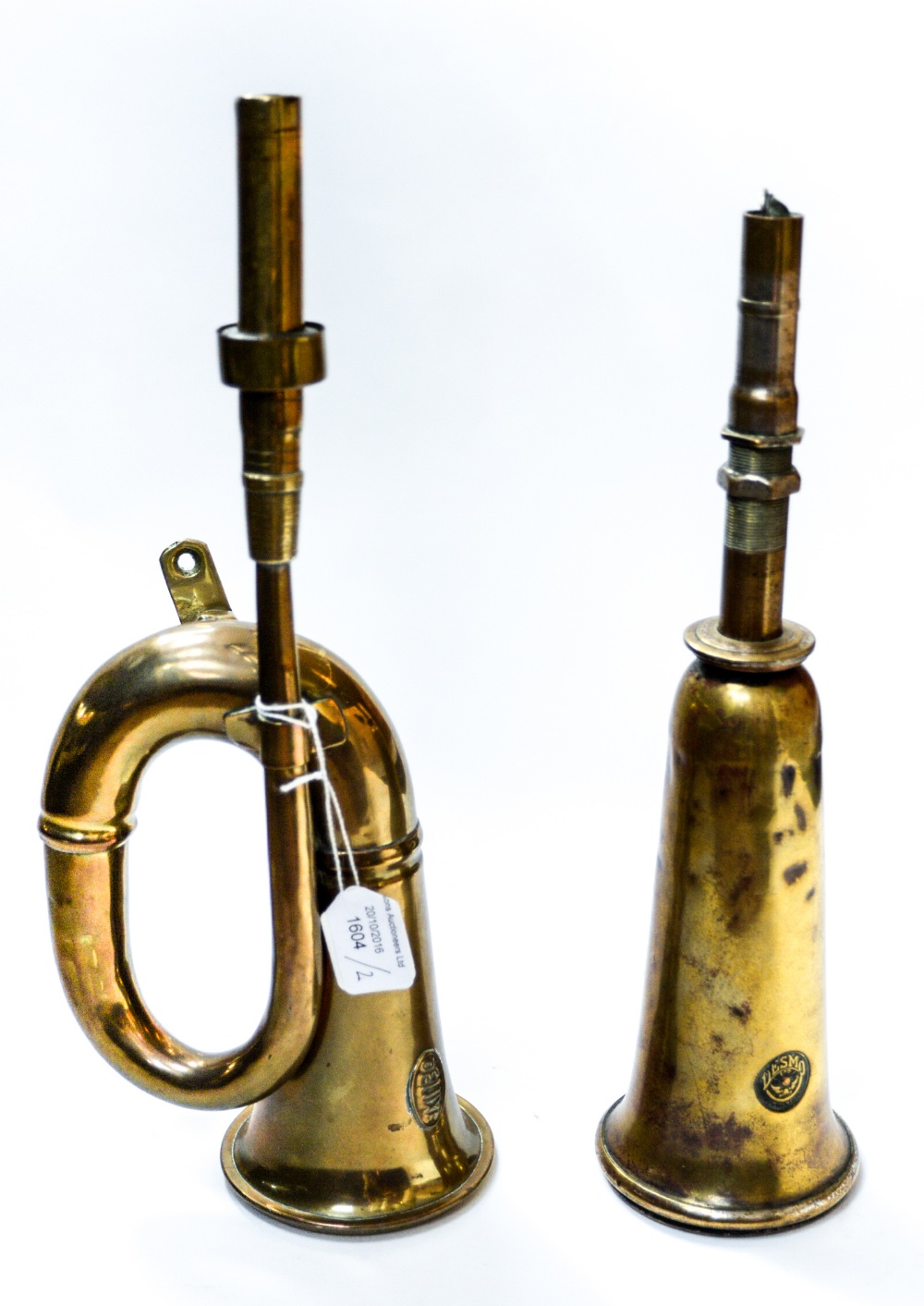 A vintage brass Desmo horn and a Deluxe brass car horn (2)