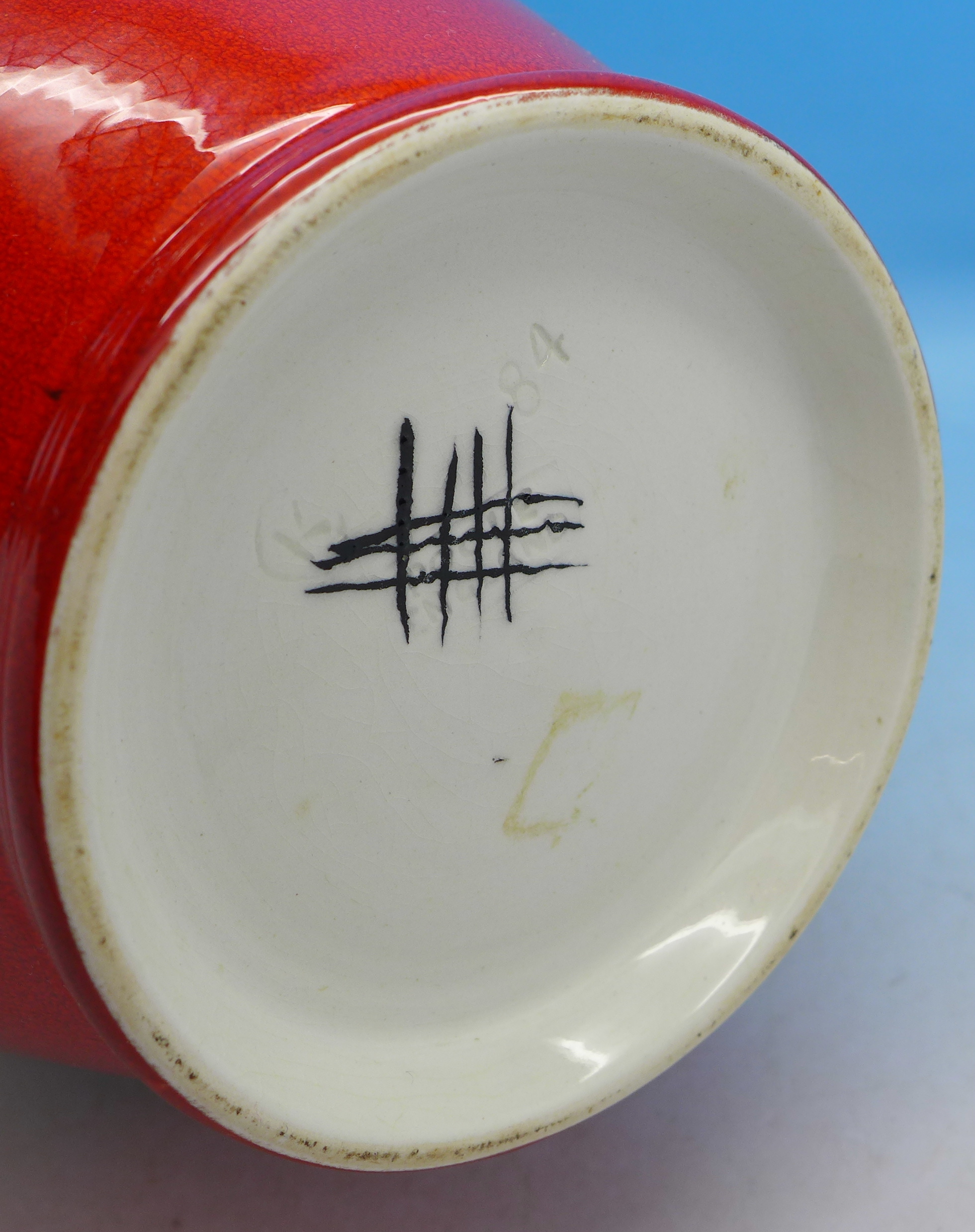 A Poole Pottery vase with painted mark over the backstamp, 23.5cm