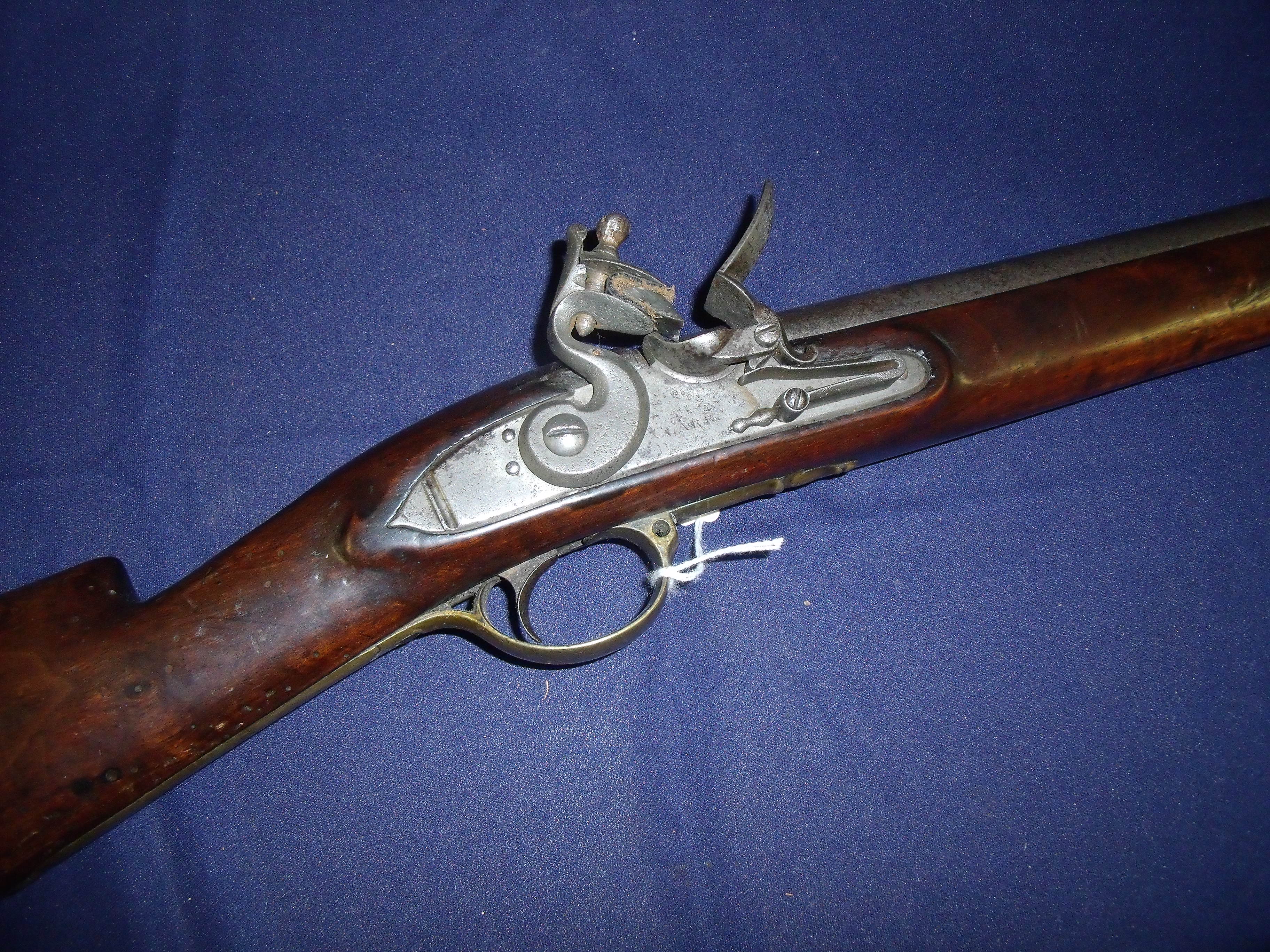 Flintlock carbine by Clark with 18¼ inch barrel with brass mounts the ...