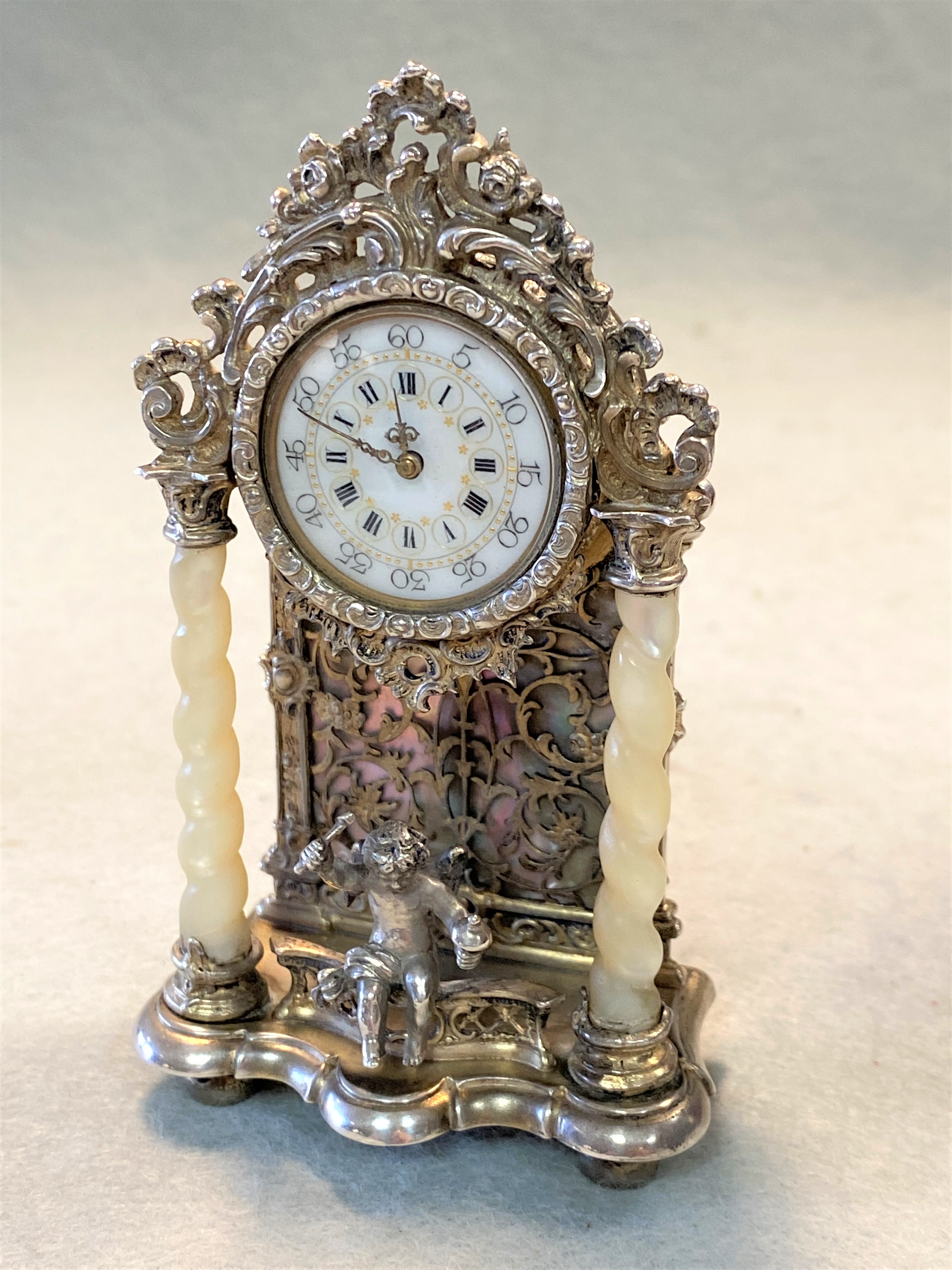 Unsigned - A (probably) German metalwares silver miniature clock, in ...
