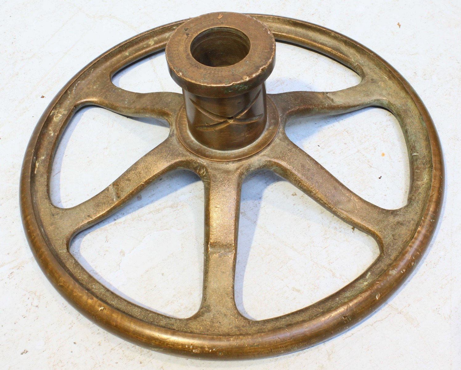 A bronze submarine hatch or door wheel. 37cm in diameter.