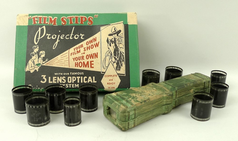 A vintage toy 'Film Stips', 35mm film projector with original box and ...