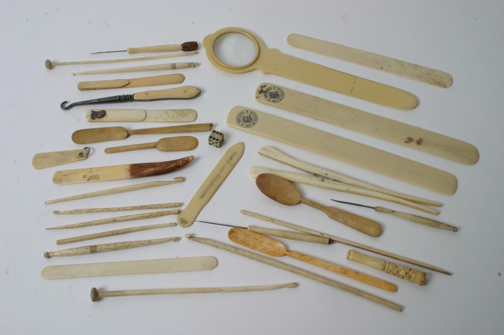 A small collection of ivory and bone sewing tools