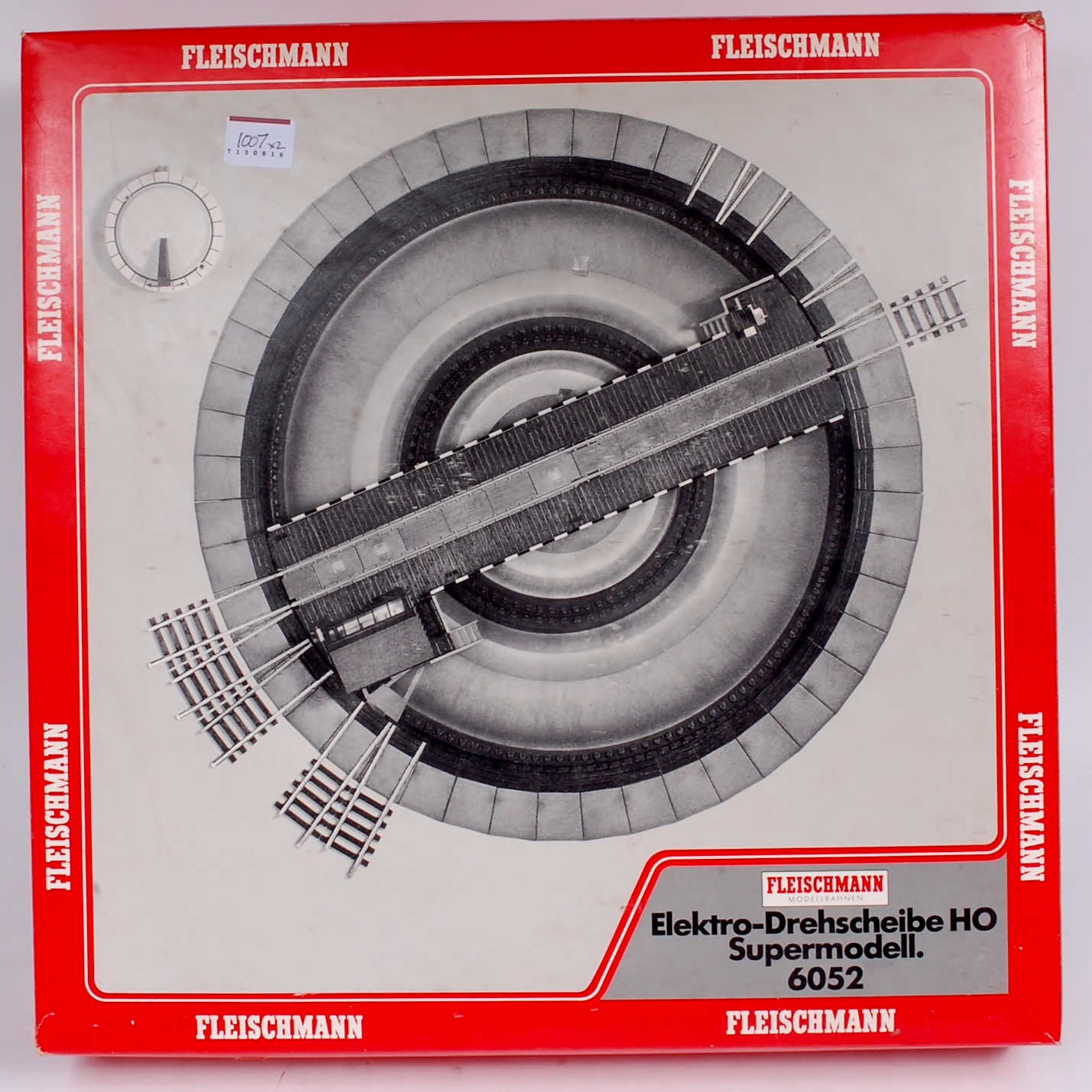 A fleischmann 6052 turntable, with additional track extension pieces ...