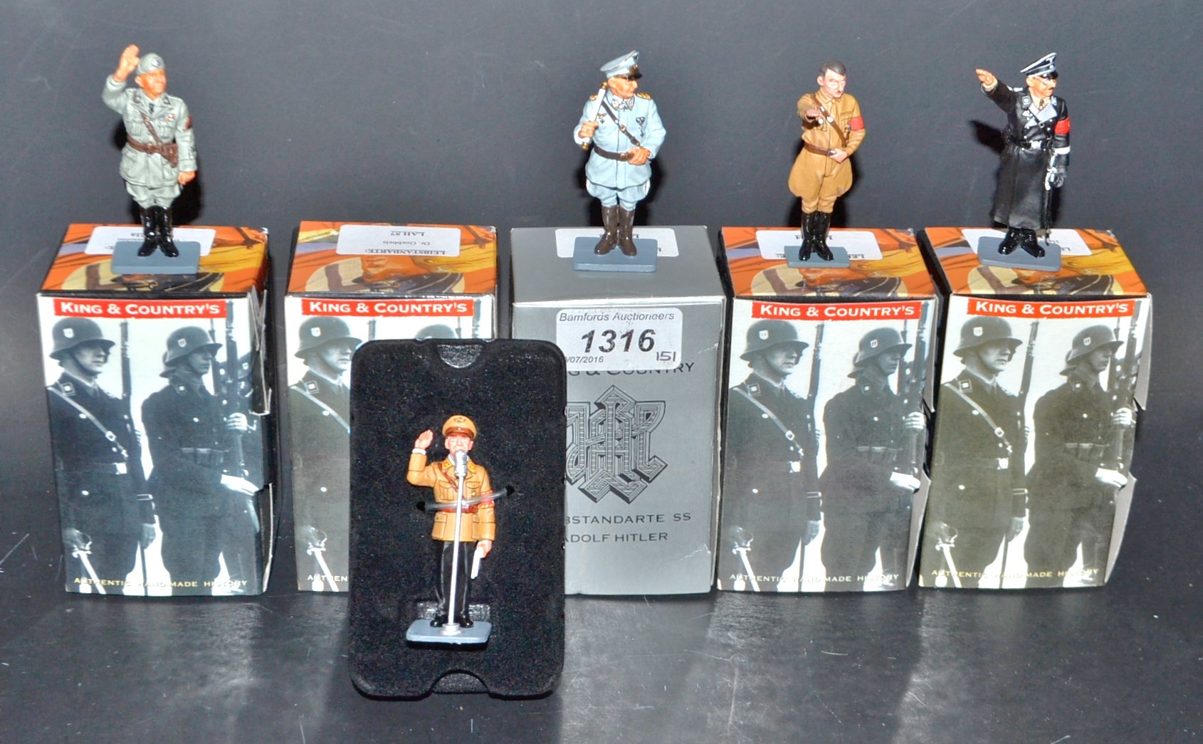 A lead miniature figure of Adolf Hitler; others, Hermann Goering ...