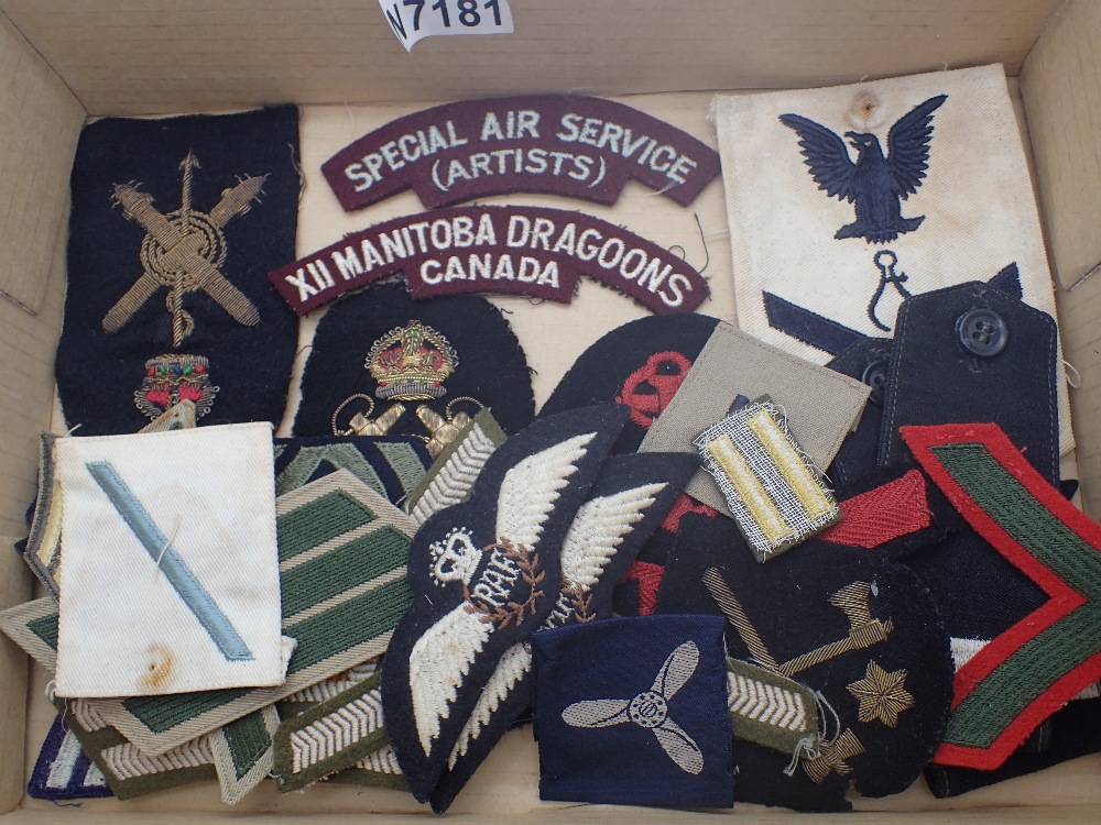 Selection of military cloth badges, including Air Forces wings, Naval etc