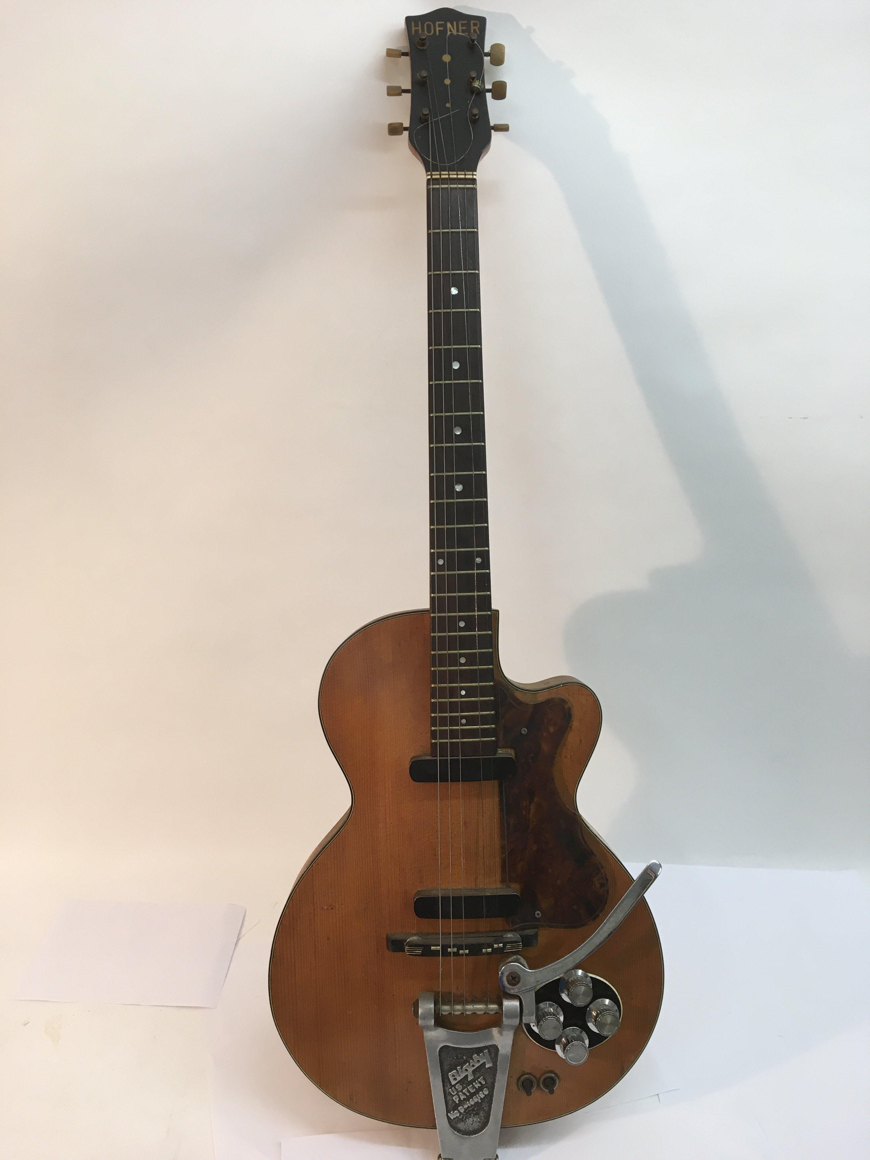 A Hofner Club 50 electric guitar with a later fitted Bigsby tremolo system.