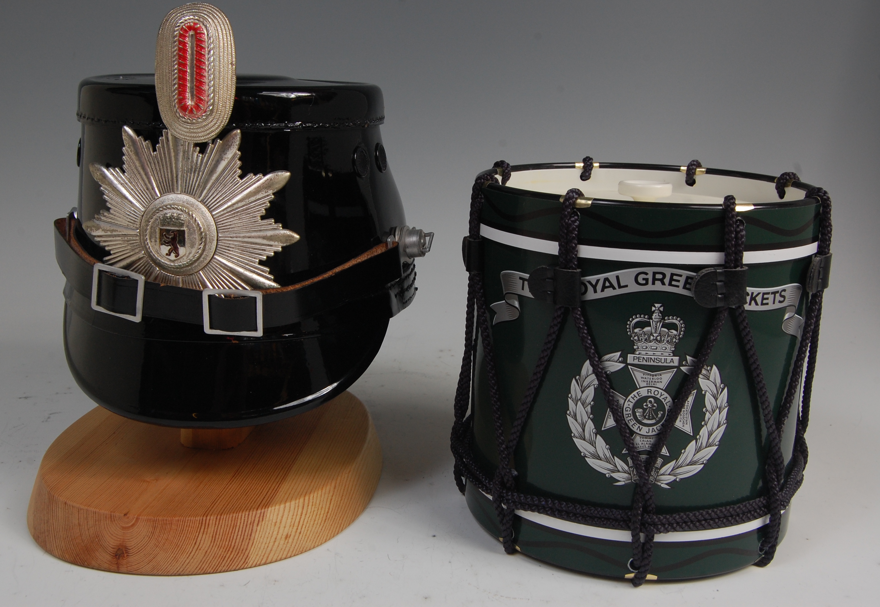 A reproduction German Berlin police shako, together with a Regimental ...