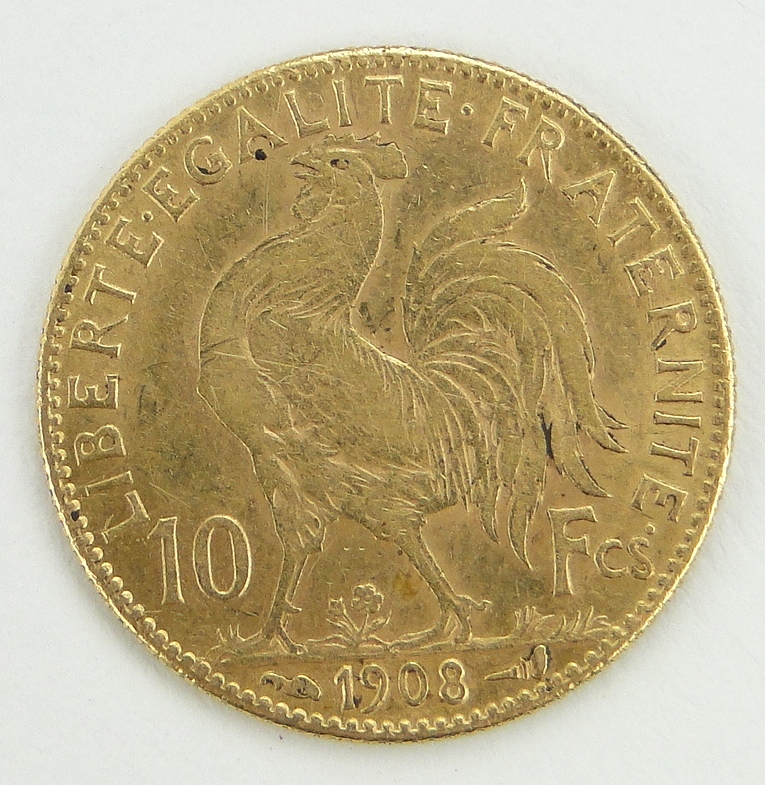 French 1908 gold 10 Franc coin.