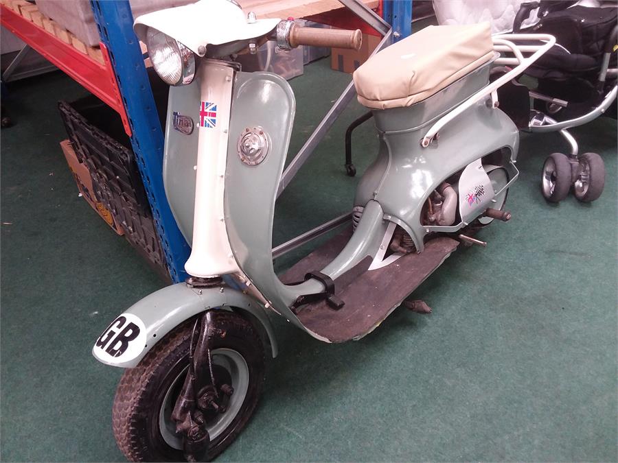 A 1960's Triumph Tina T10 automatic 100cc 2 stroke scooter.