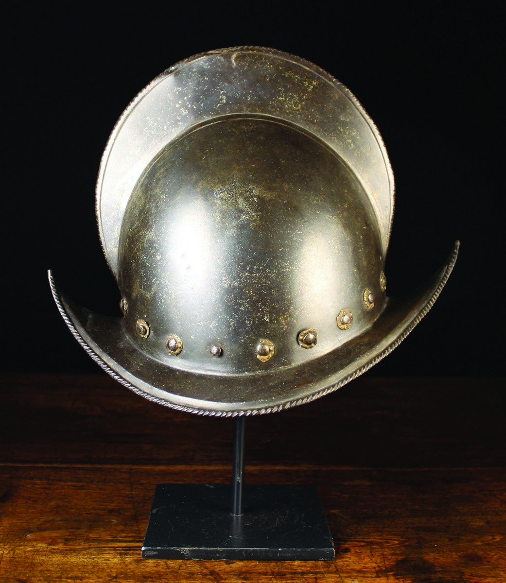 A 16th CenturySpanish Conquistador Morion Helmet; the comb and upswept ...