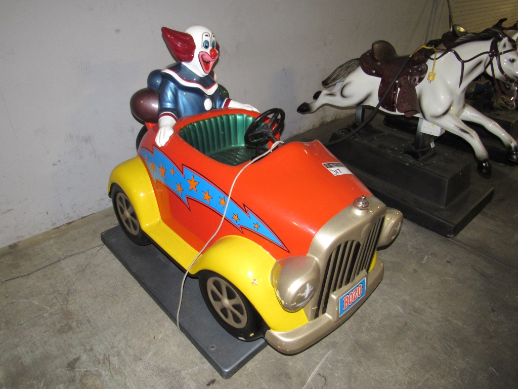 KIDDIE RIDE BOZO THE CLOWN CAR. Item is in used condition. Evidence of ...