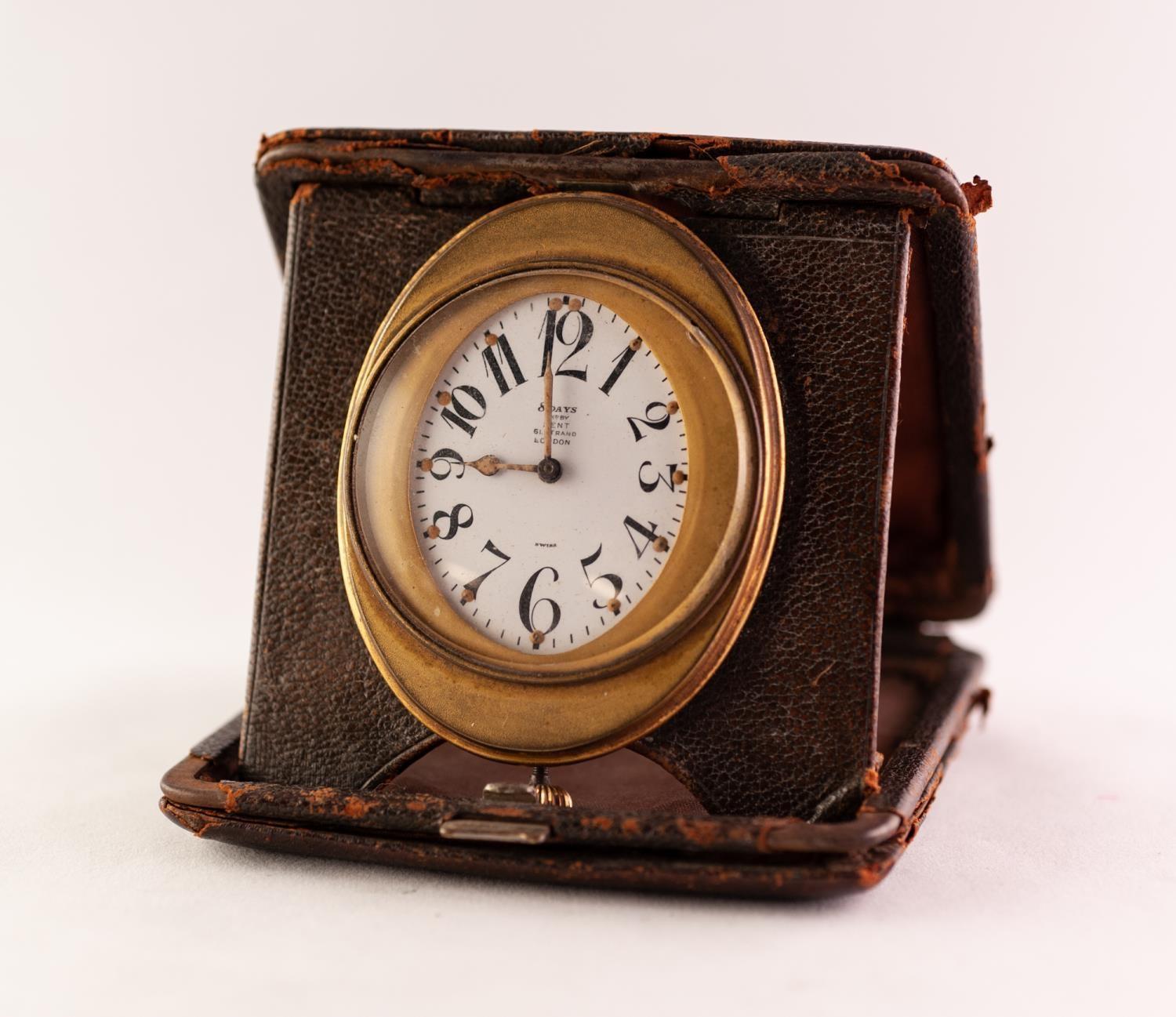 AN EARLY 20TH CENTURY SEPTIMA WATCH CO. TRAVEL CLOCK11 jewel movement ...