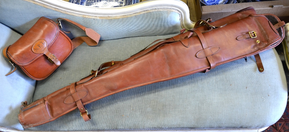 A good quality pair of leather shotgun slips by Parsons & Sons of ...